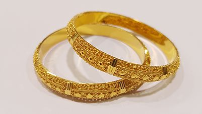 Titanium vs Gold: Comparing Durability, Price, and Style | Bajaj Finance